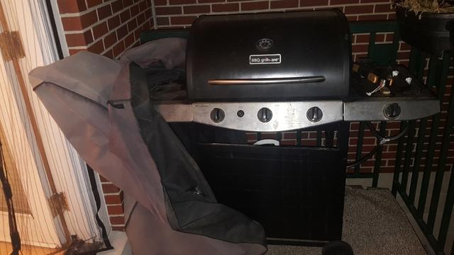 Used Grill for sale, with propane tank and cover - $50 - Denver, CO